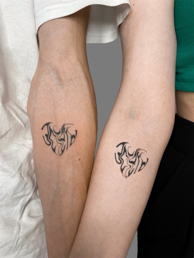 Interlocking couple tattoos - Bronctattooaus.com